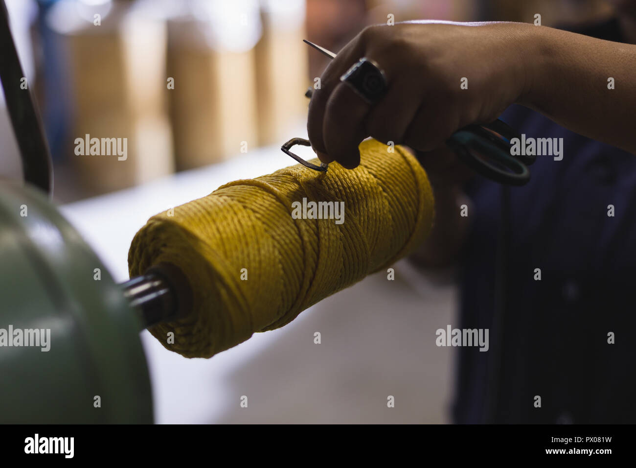 Worker working in rope making industry Stock Photo - Alamy