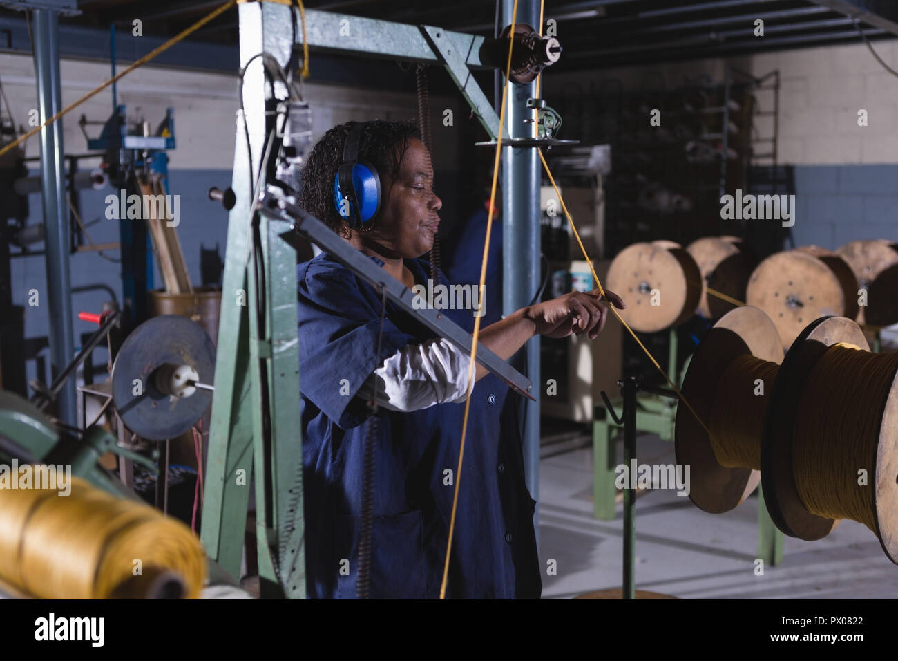 Attentive female worker working in hi-res stock photography and images ...