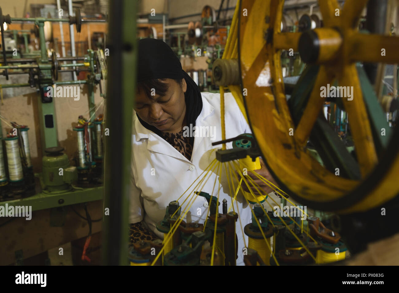 Standing working skill industry loom hi-res stock photography and ...