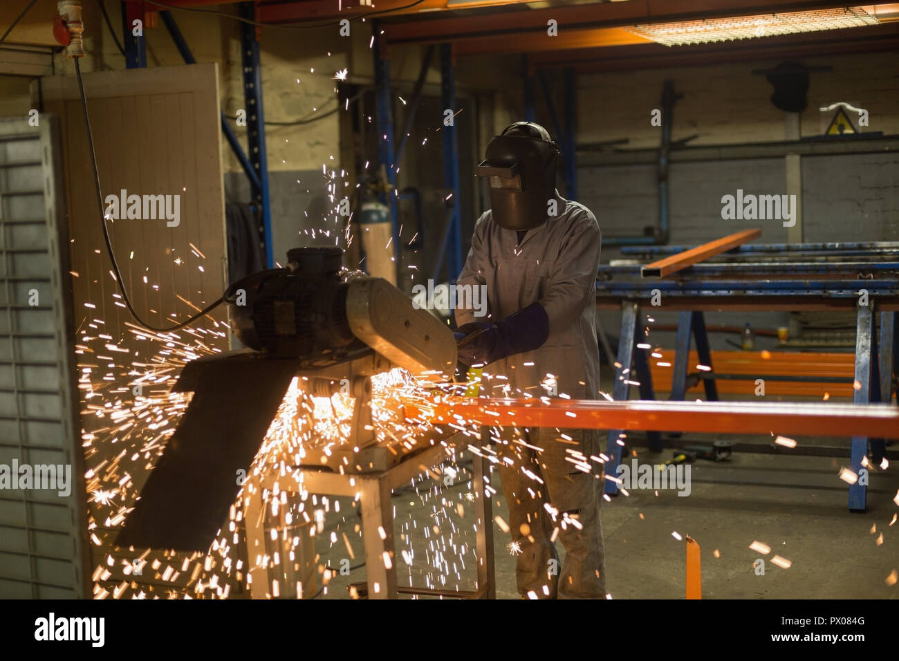 Worker using machine in rope making industry Stock Photo - Alamy