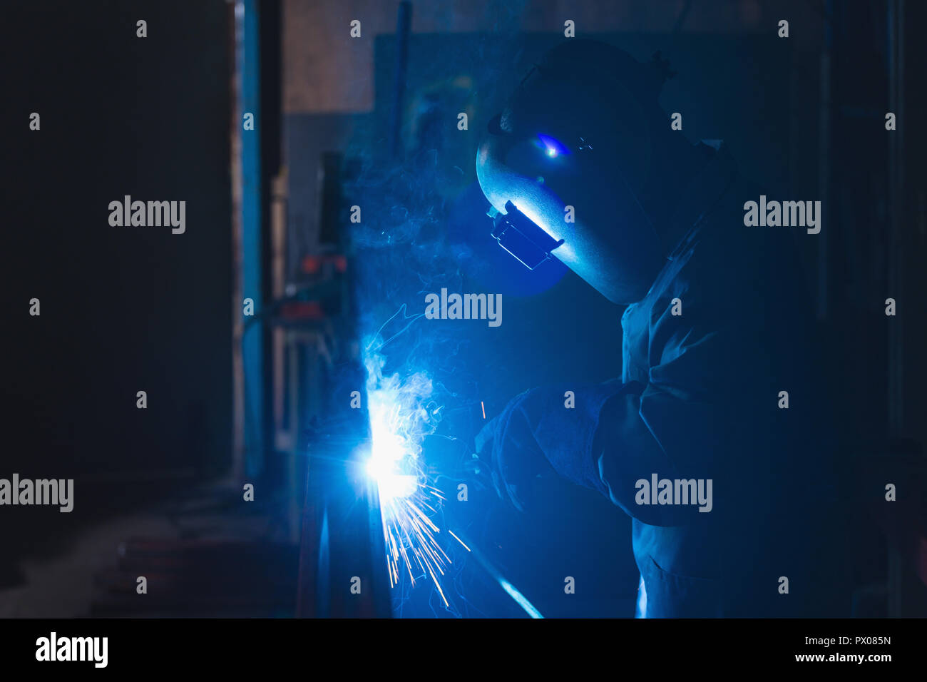 Man welding in uniform hi-res stock photography and images - Alamy
