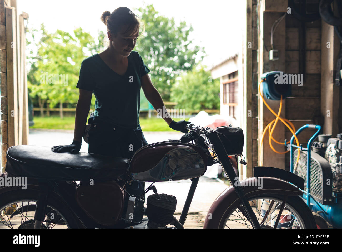 Female mechanic motorcycle hi-res stock photography and images - Alamy