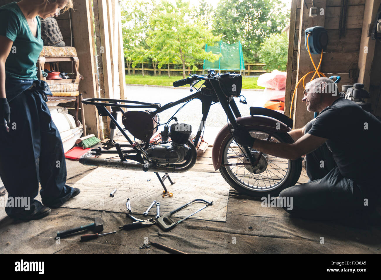 Repairing bike tyre hi-res stock photography and images - Alamy