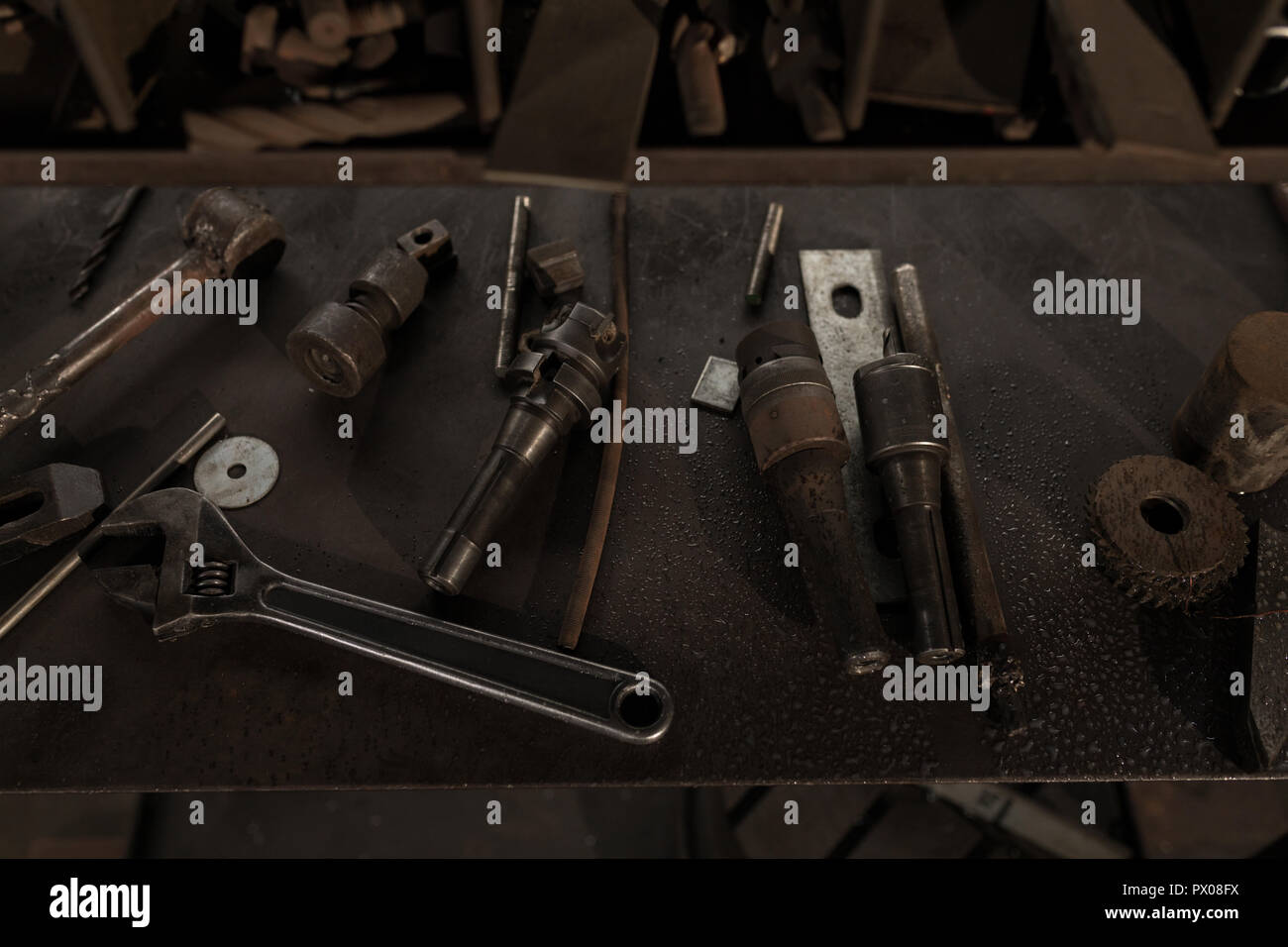 Blacksmith tool arrangement in workshop Stock Photo - Alamy