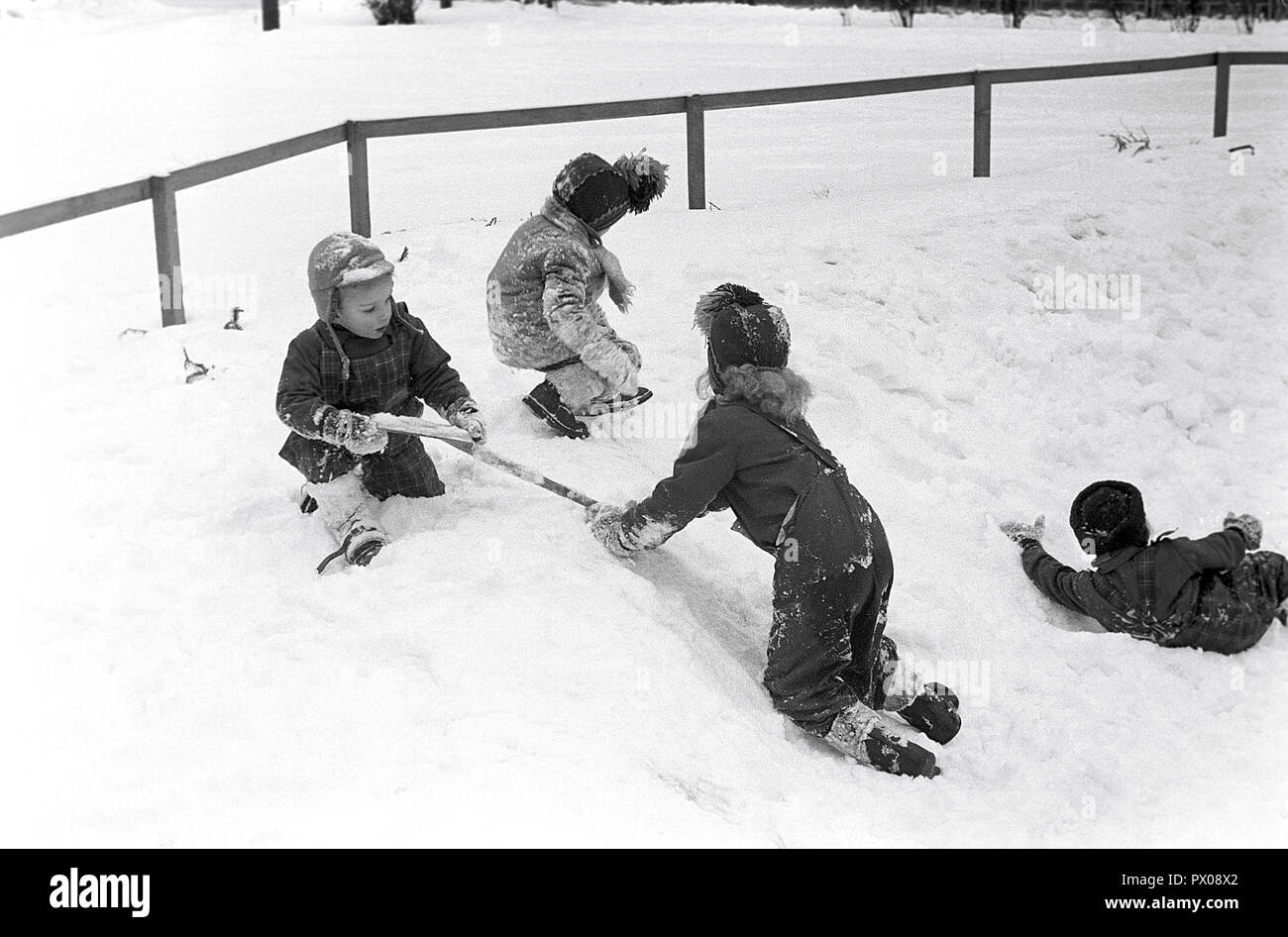 Children in snow 1950s hi-res stock photography and images - Alamy