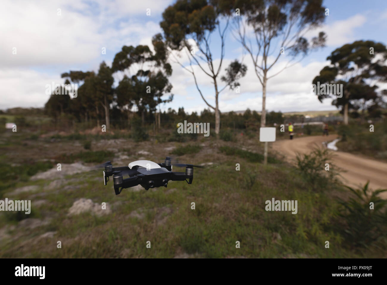 Drone hovering in the air Stock Photo - Alamy