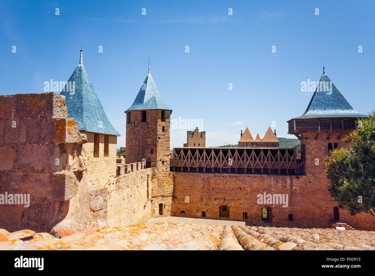 Count's Castle defensive wall with towers and hoarding, Carcassonne ...