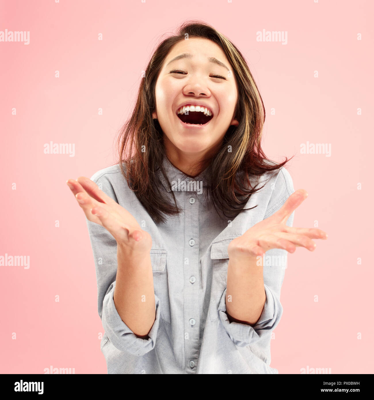 Delight. Beautiful female half-length front portrait isolated on pink ...