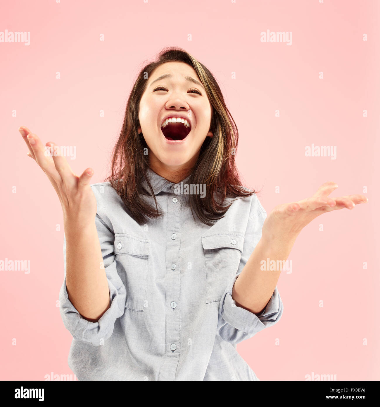 Delight. Beautiful female half-length front portrait isolated on pink ...