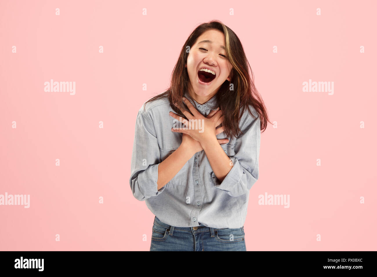 Delight. Beautiful female half-length front portrait isolated on pink ...