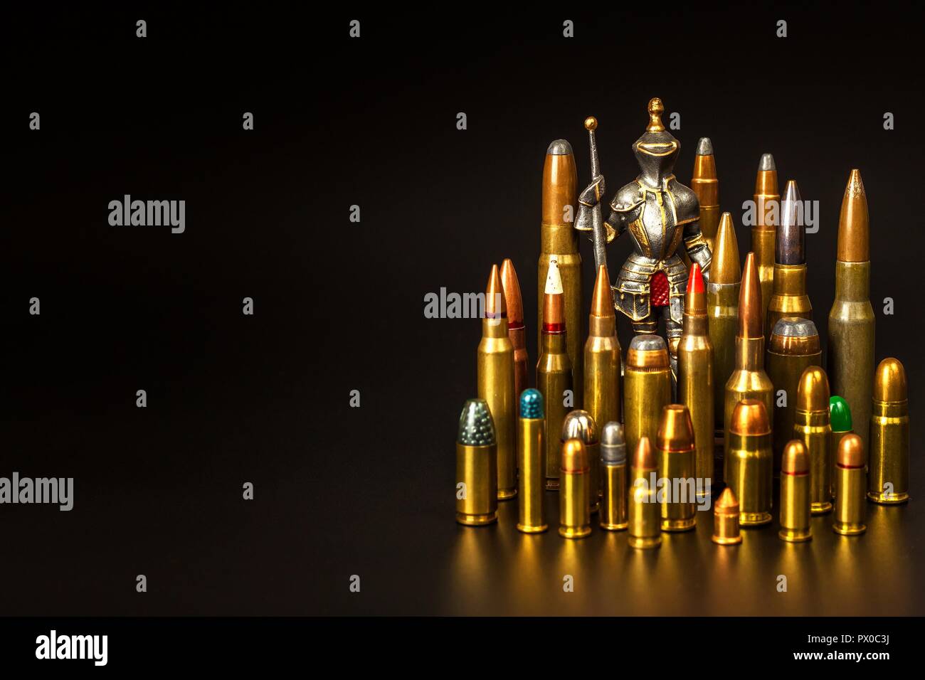 Medieval knight and modern ammunition. Different types of ammunition on ...