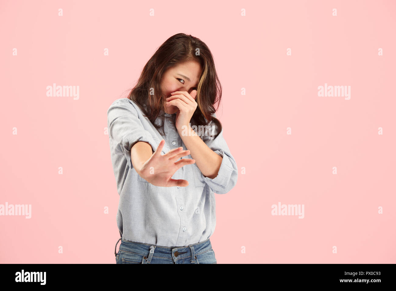 Reject, rejection, doubt concept. Doubtful woman with thoughtful ...