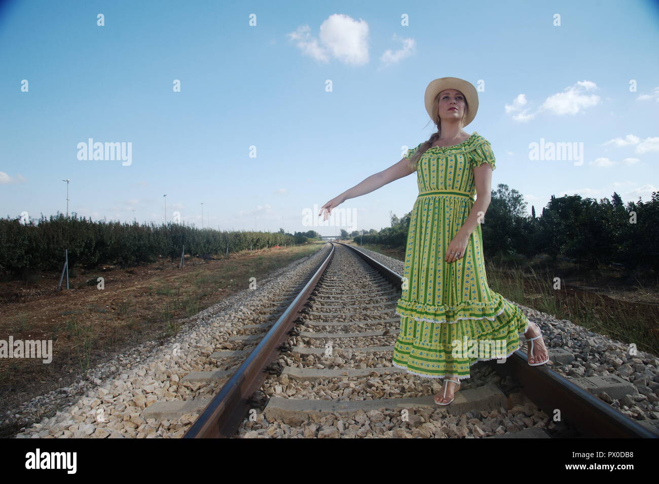 Young pretty hitchhiking woman stand hi-res stock photography and ...