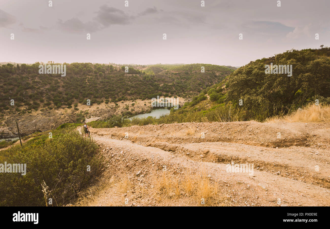 Gravel road going down hi-res stock photography and images - Alamy
