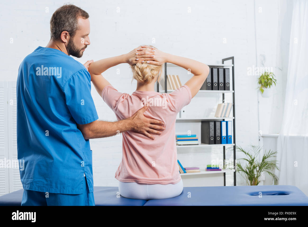 Woman back massage rear view hi-res stock photography and images - Alamy
