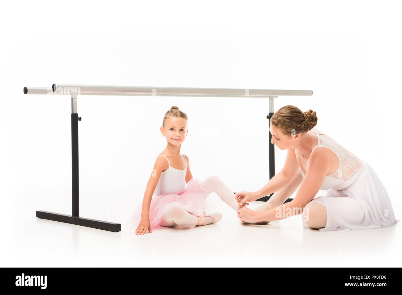 Ballerina Tying Pointe Shoes Stock Photos & Ballerina Tying Pointe ...