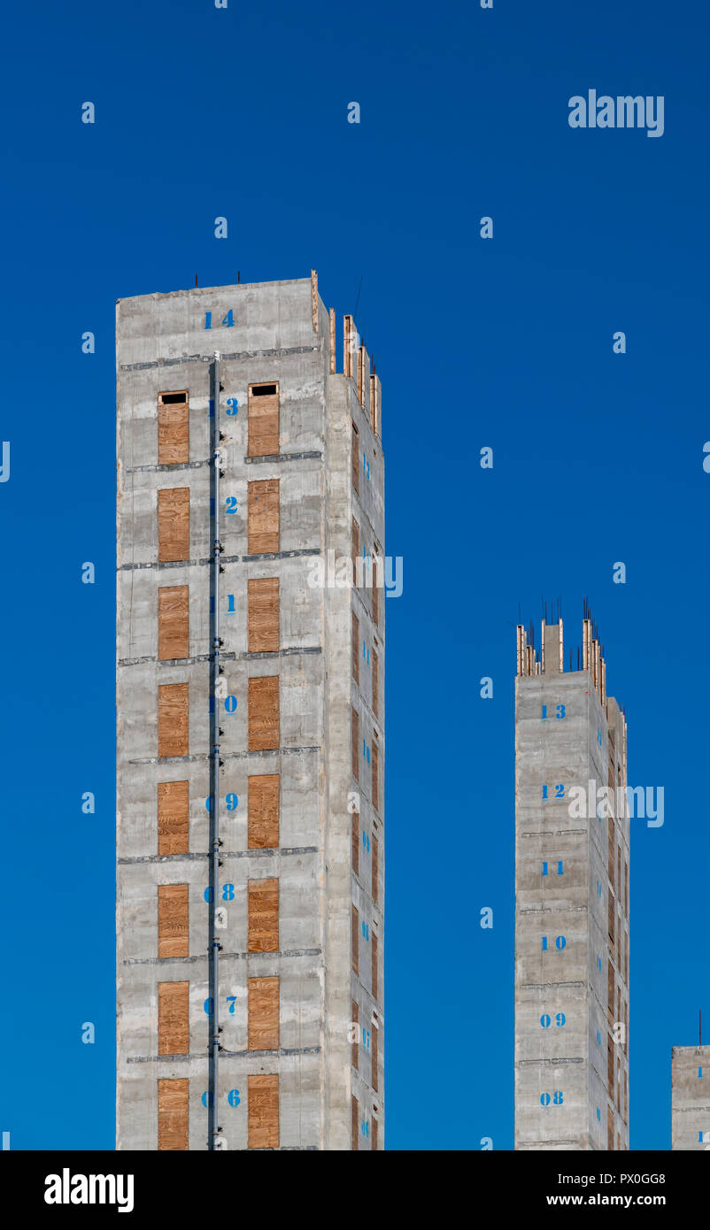 Central concrete cores of three new tower blocks in London at Royal ...