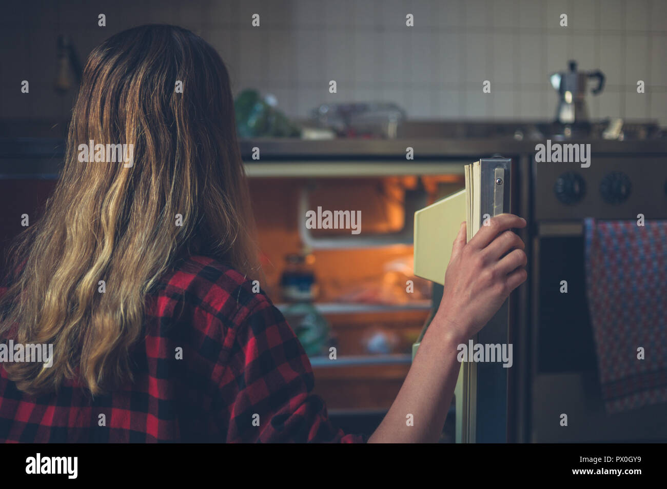 Woman Opening Fridge Door High Resolution Stock Photography and Images ...