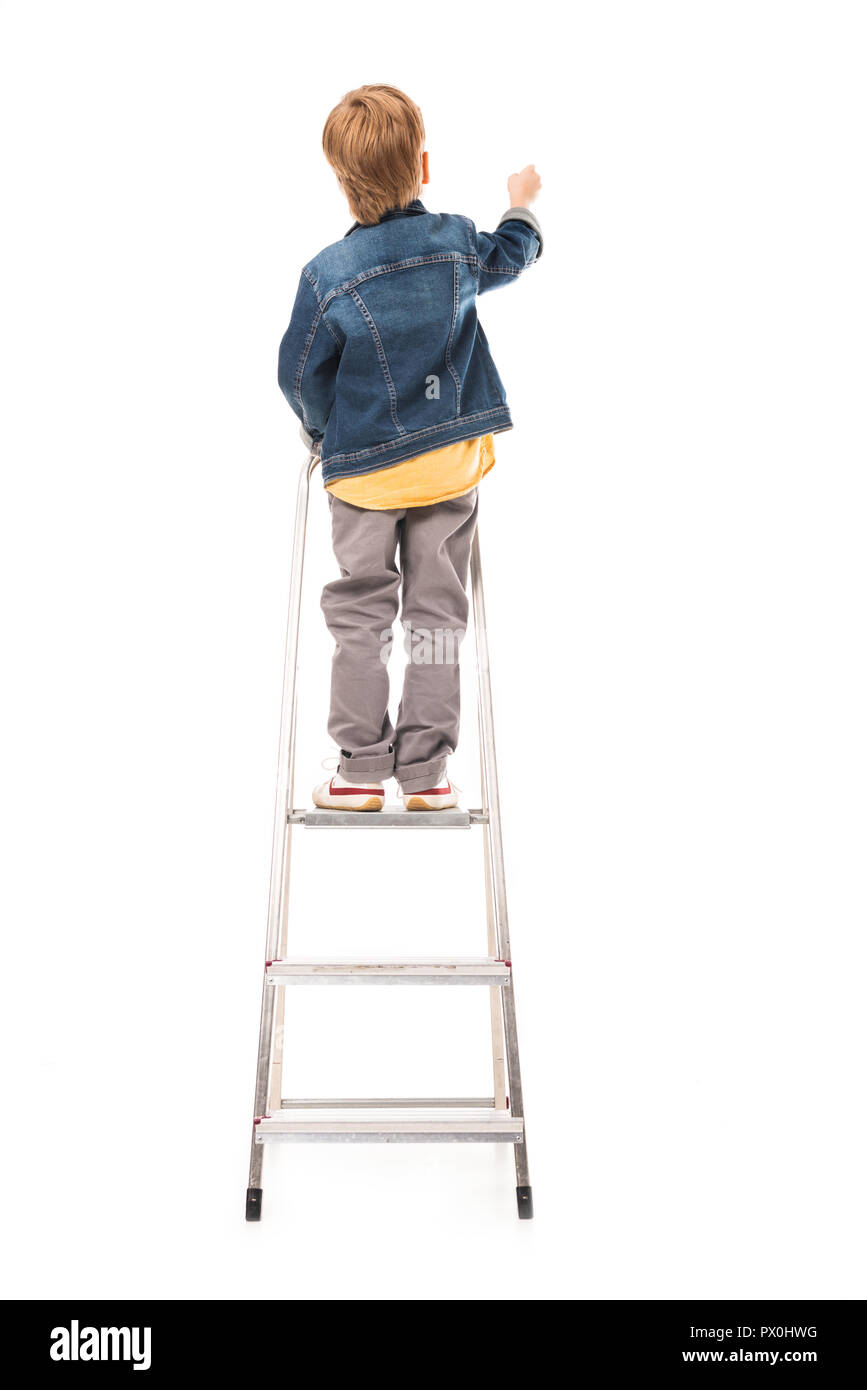 Boy standing on ladder hi-res stock photography and images - Alamy