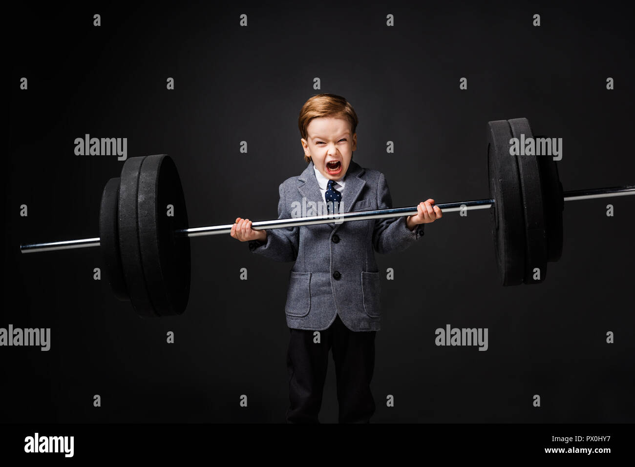 Boy lifting girl hi-res stock photography and images - Alamy