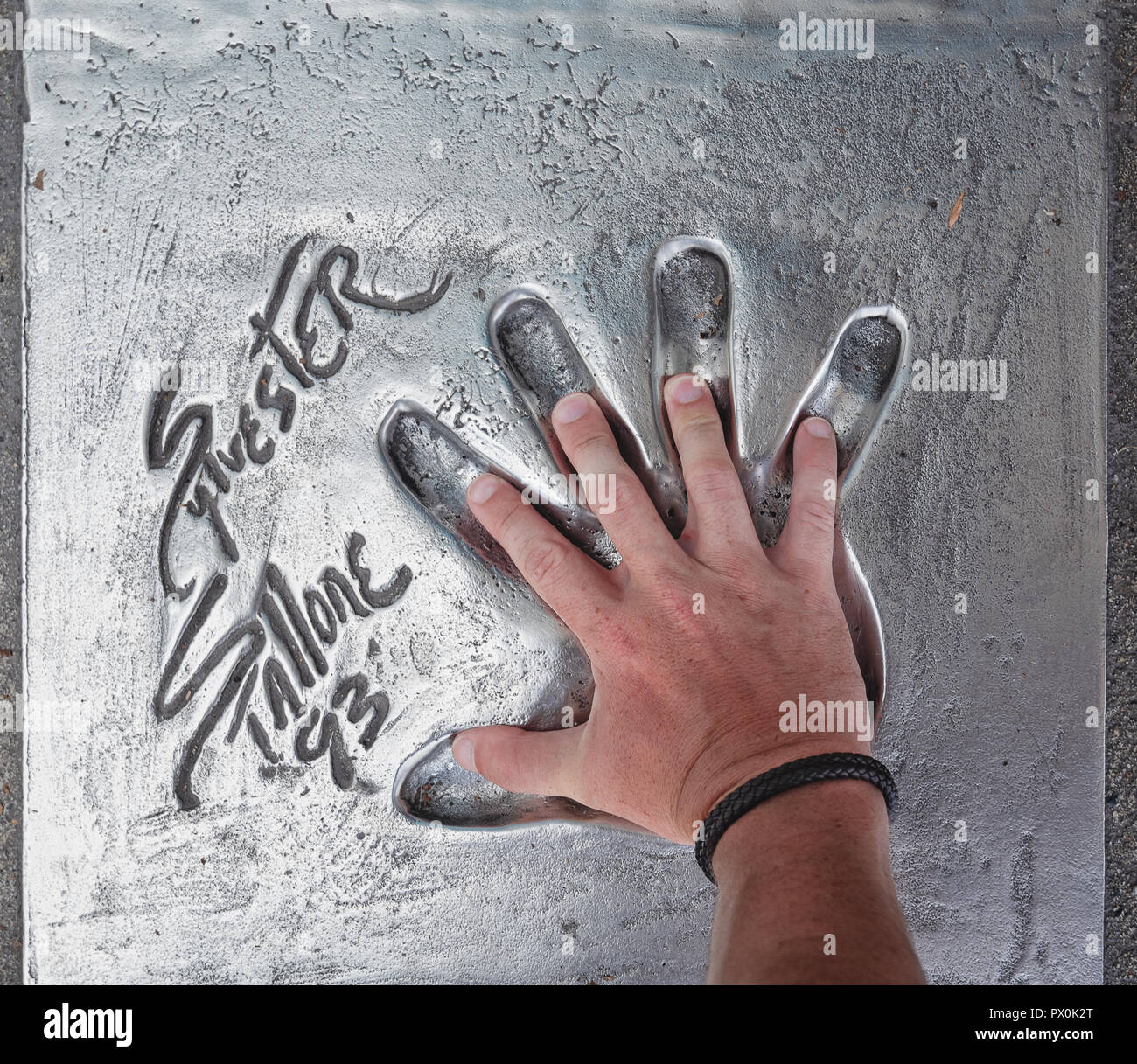 Hand print in concrete hi-res stock photography and images - Alamy