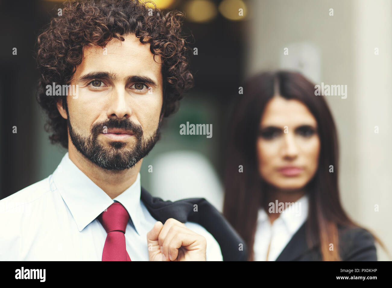 Two business people outdoor Stock Photo - Alamy
