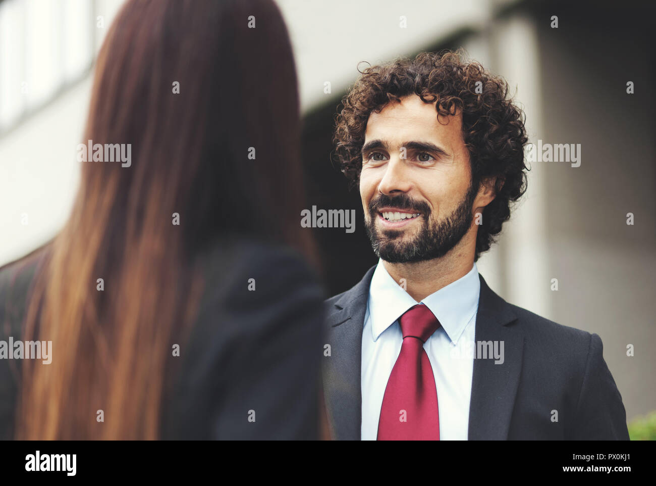 Business people talking outdoor Stock Photo - Alamy