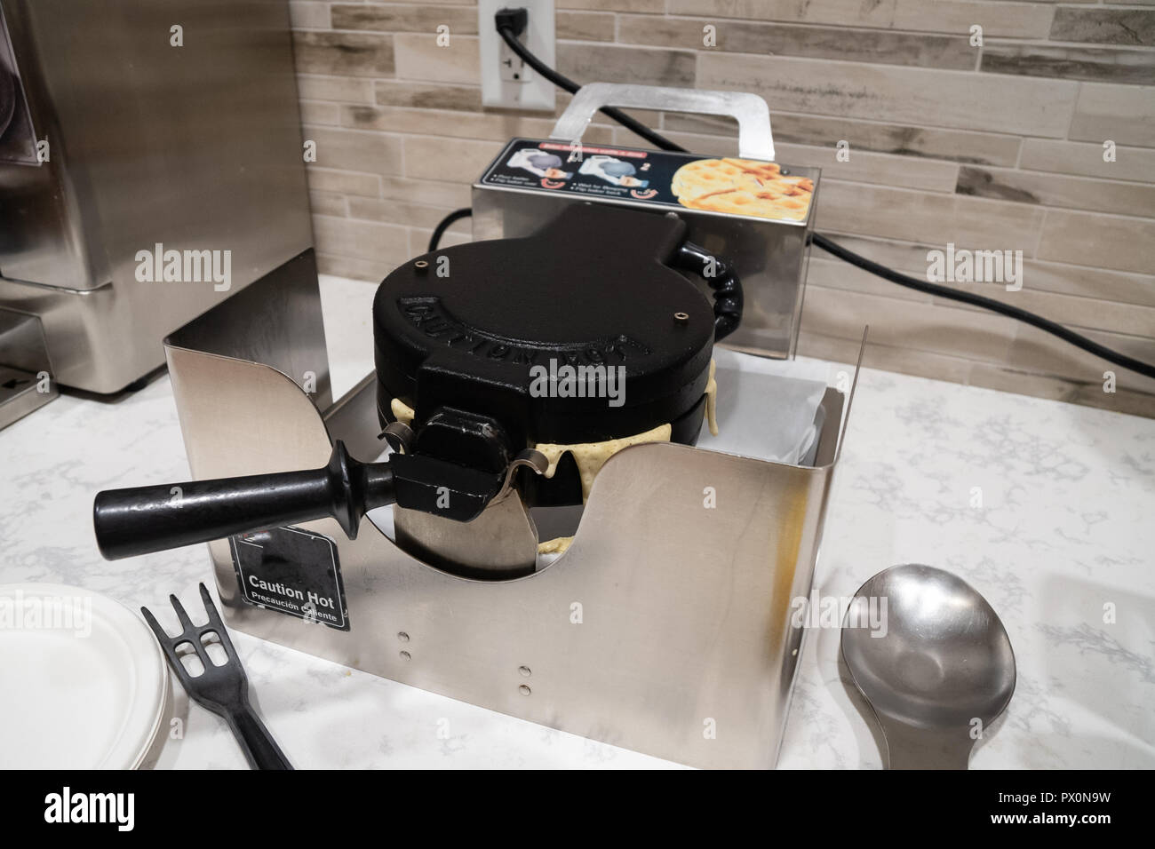 Make your own waffle maker station at a free hotel continential ...