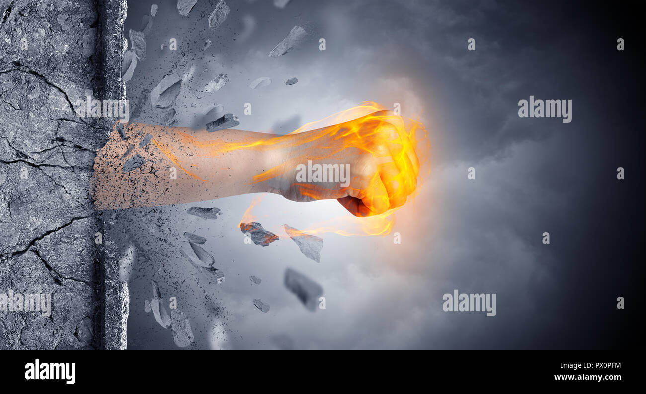 Big hand hits intense and breaks a crass stonewall Stock Photo - Alamy