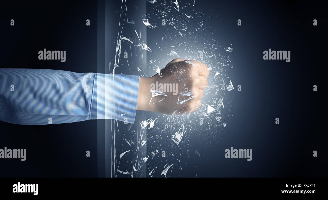 Big hand hits intense and breaks glasses Stock Photo - Alamy