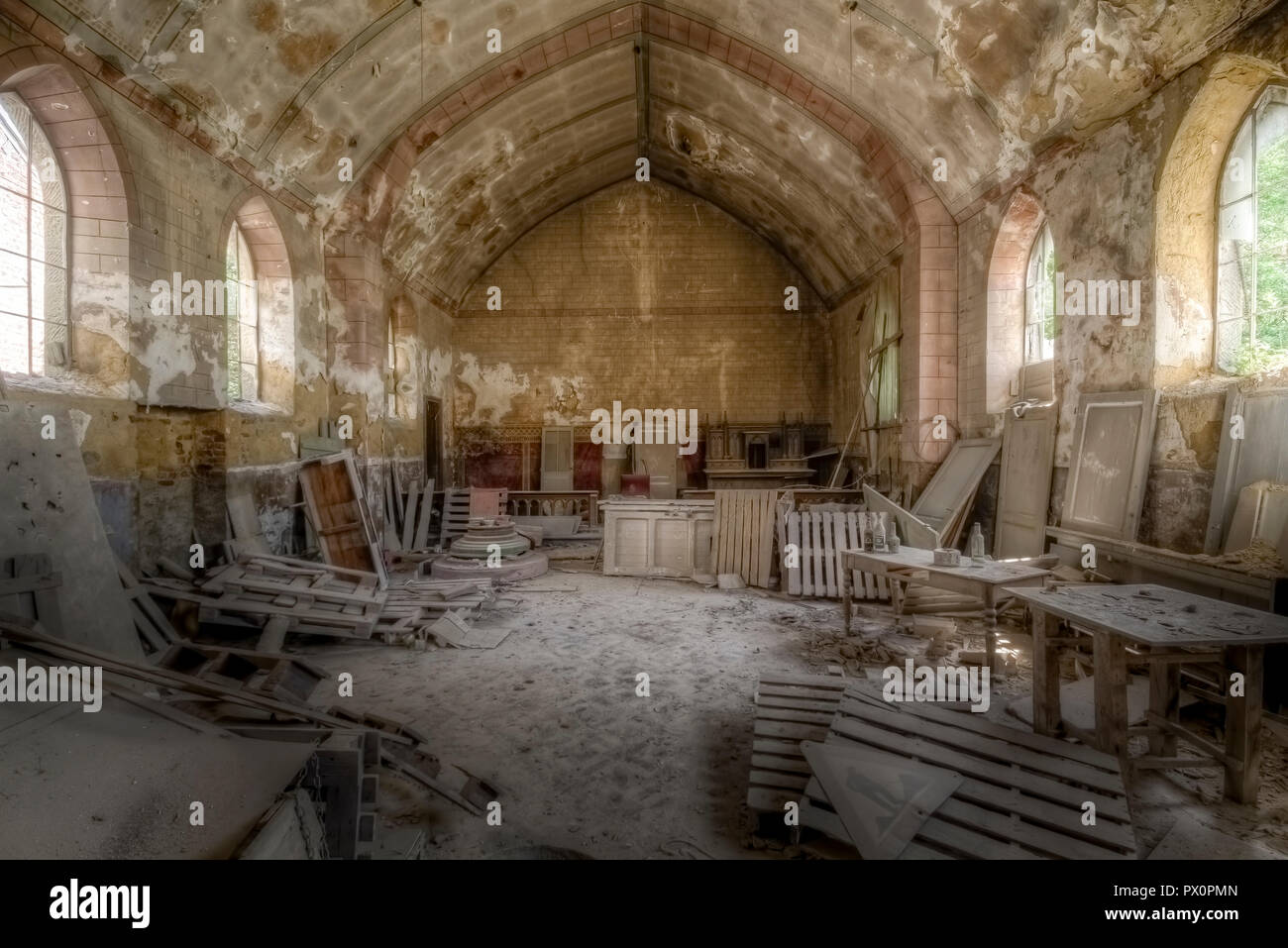 Interior view of an abandoned church covered in dust in Belgium Stock ...