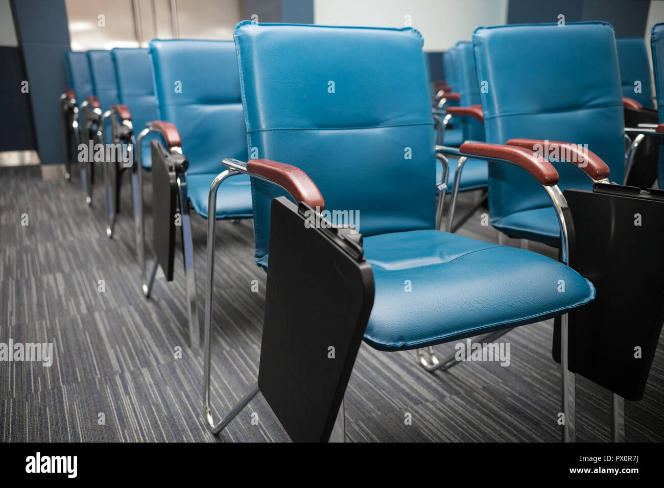 Conference Meeting Room. Row of Blue Chairs Stock Photo - Alamy