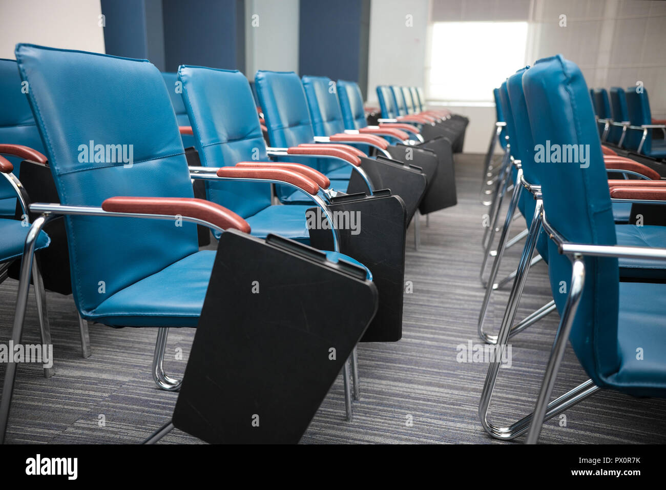 Conference Meeting Room. Rows of Blue Chairs Stock Photo - Alamy