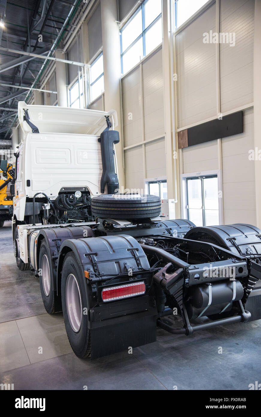 White commercial truck parked in manufacture building. Back view Stock ...