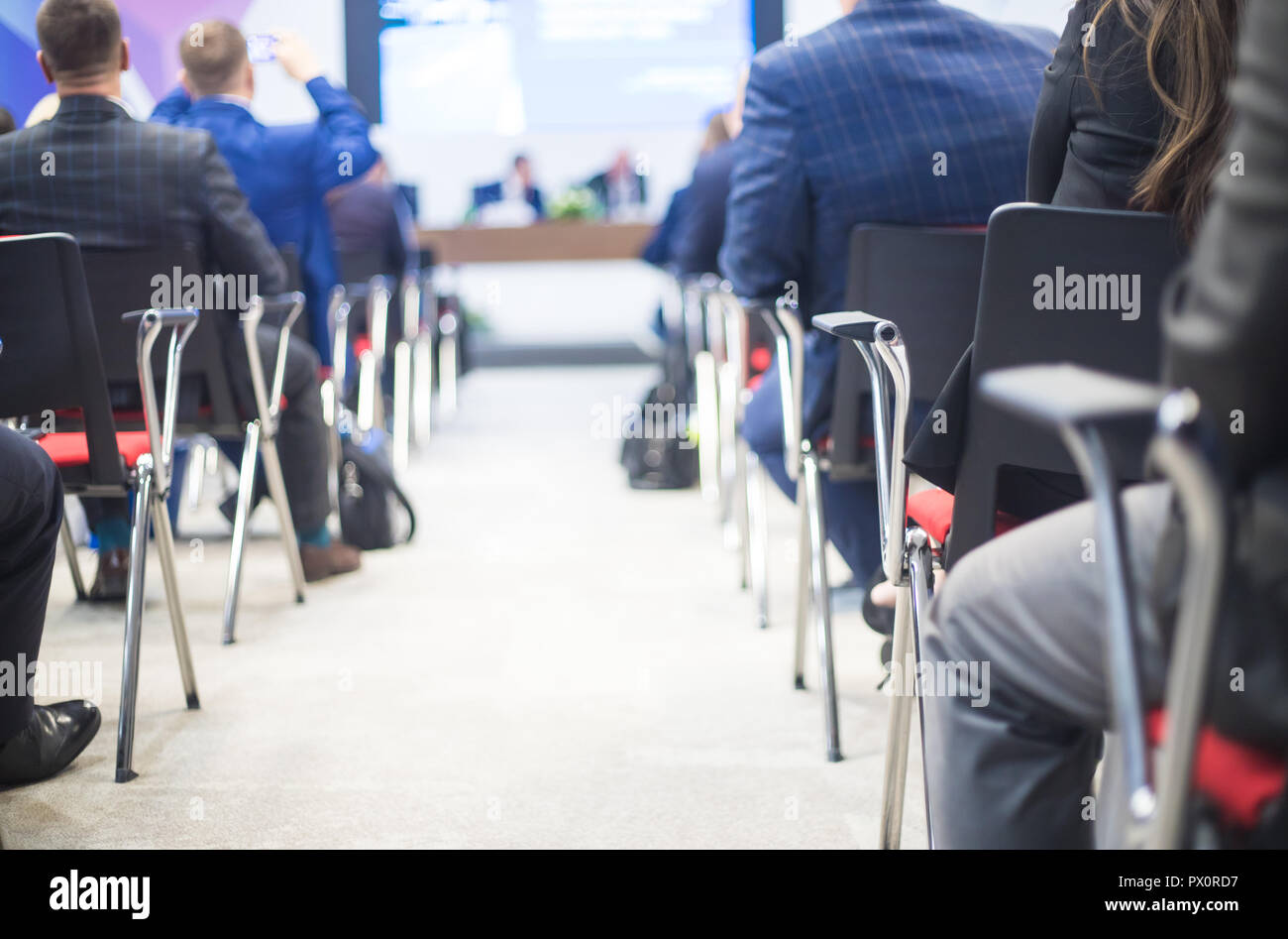 Conference Meeting Room. Business people sitting in conference hall ...