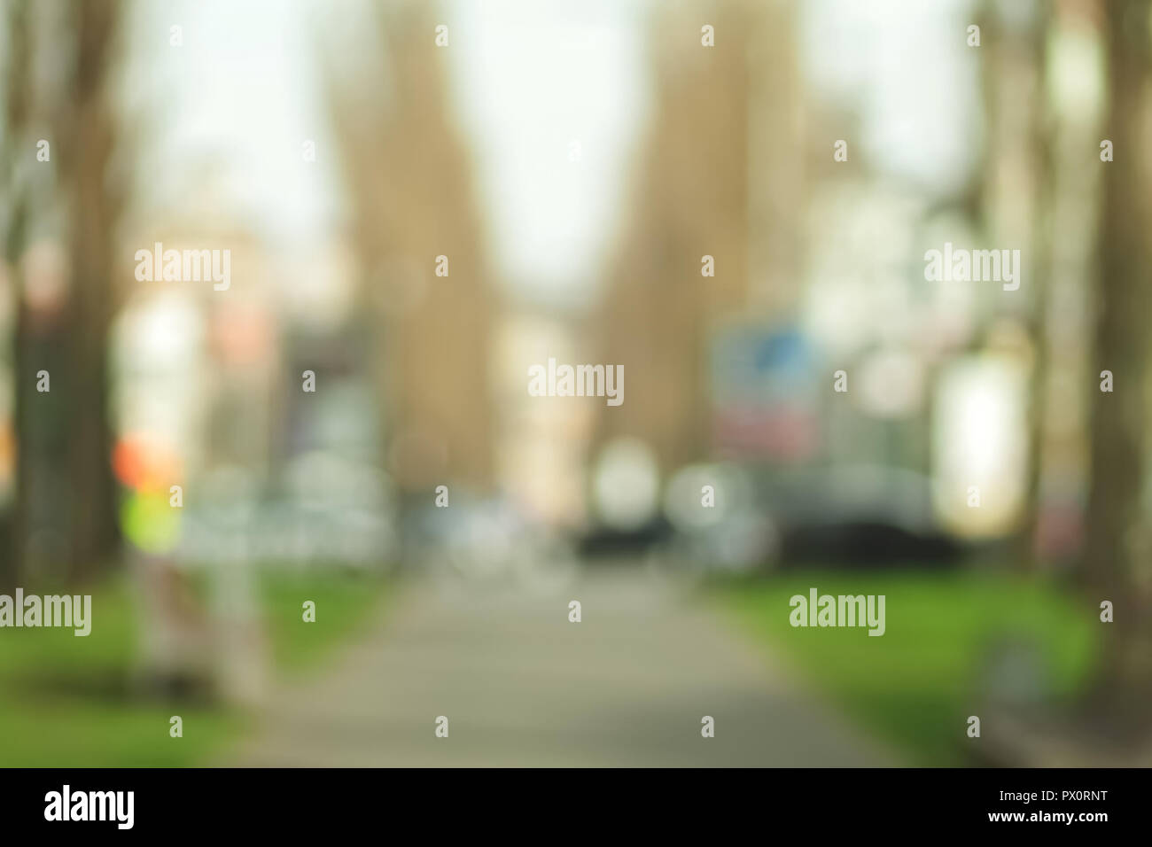 Spring blurry city. Defocused cityscape background. Blurry architecture ...