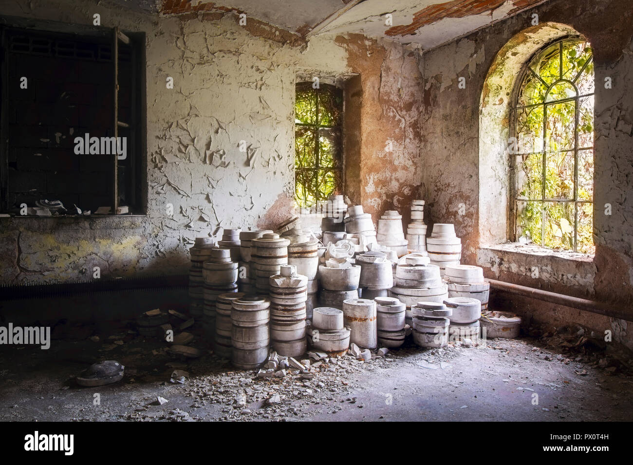 Interior view of an abandoned pottery factory in France Stock Photo - Alamy
