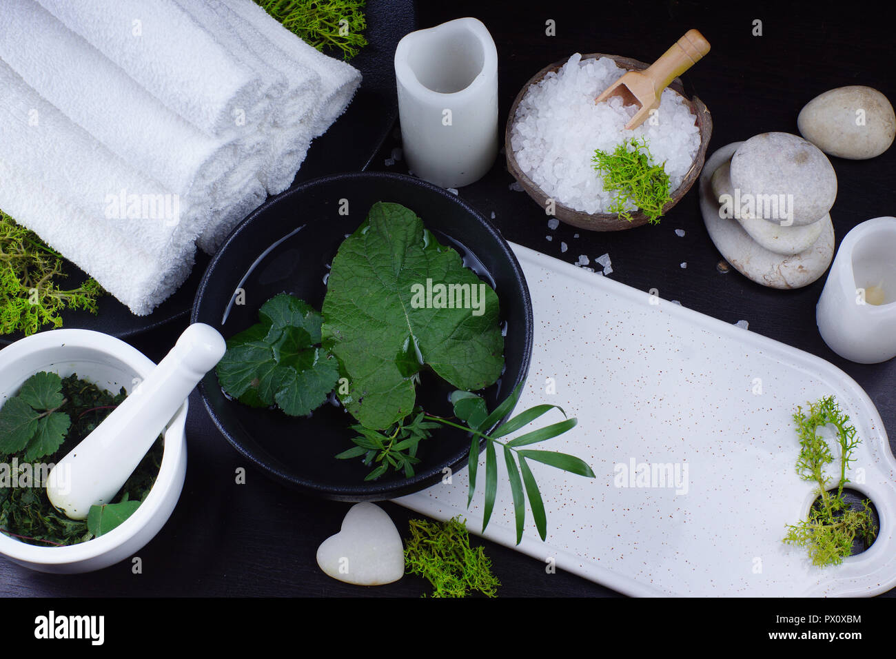 Spa set with white color with green details of natural greens and moss ...