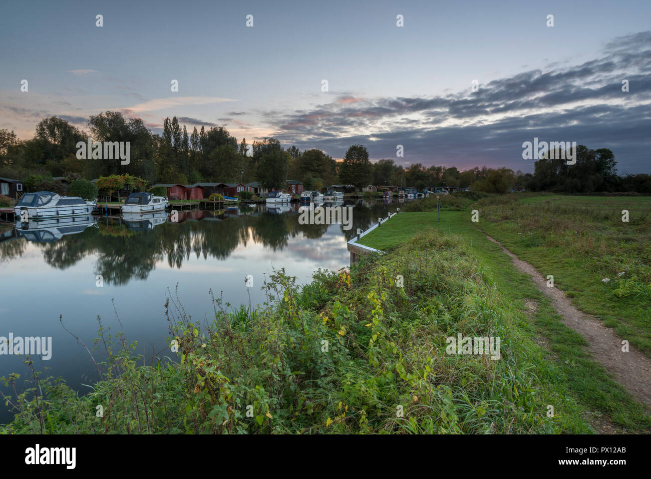 boats moored on the the river nene at orton mere or orton lock in ...
