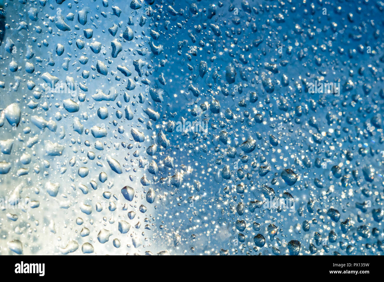 background of raindrops on window glass, toned, close-up Stock Photo ...