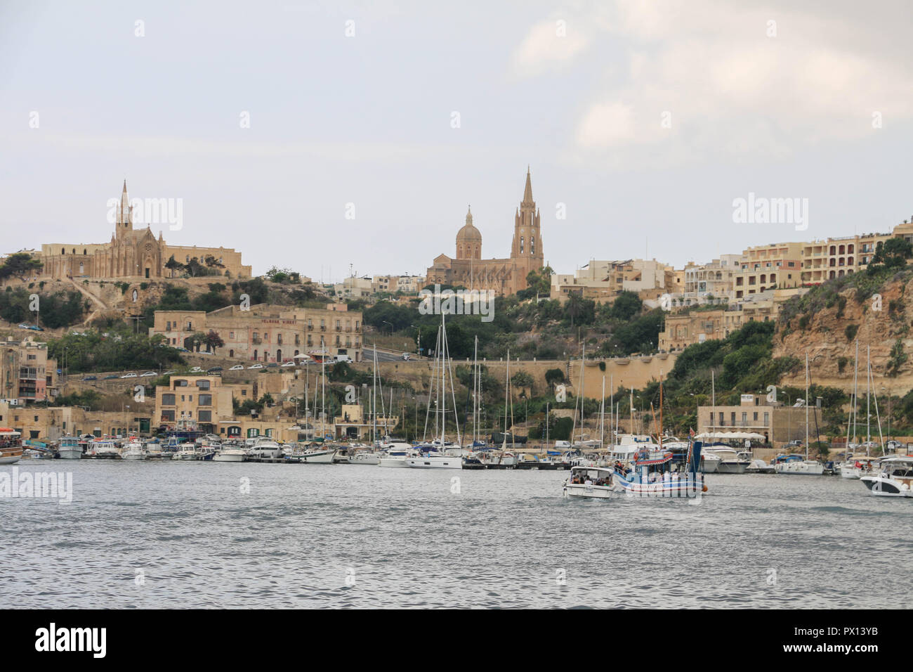Big harbour with many big ans small ships at L-Imgarr, Comino Stock ...