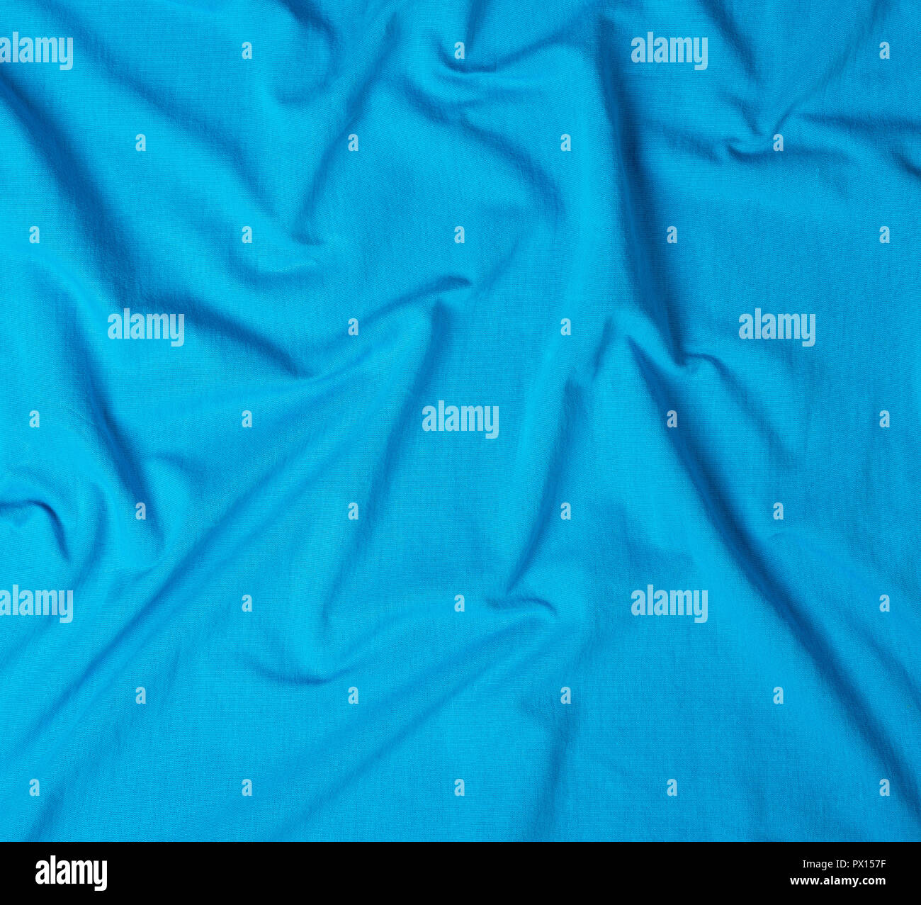 crumpled cotton fabric of blue color, abstract background Stock Photo ...