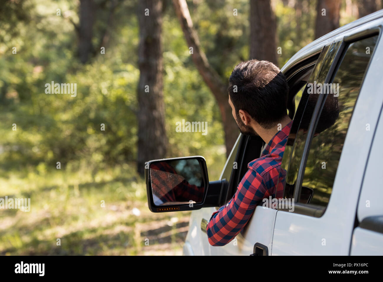 Rear view of driver hi-res stock photography and images - Alamy