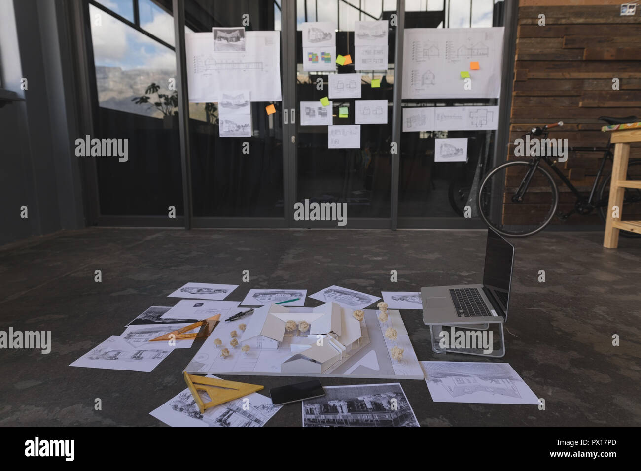 House model and document in office Stock Photo - Alamy