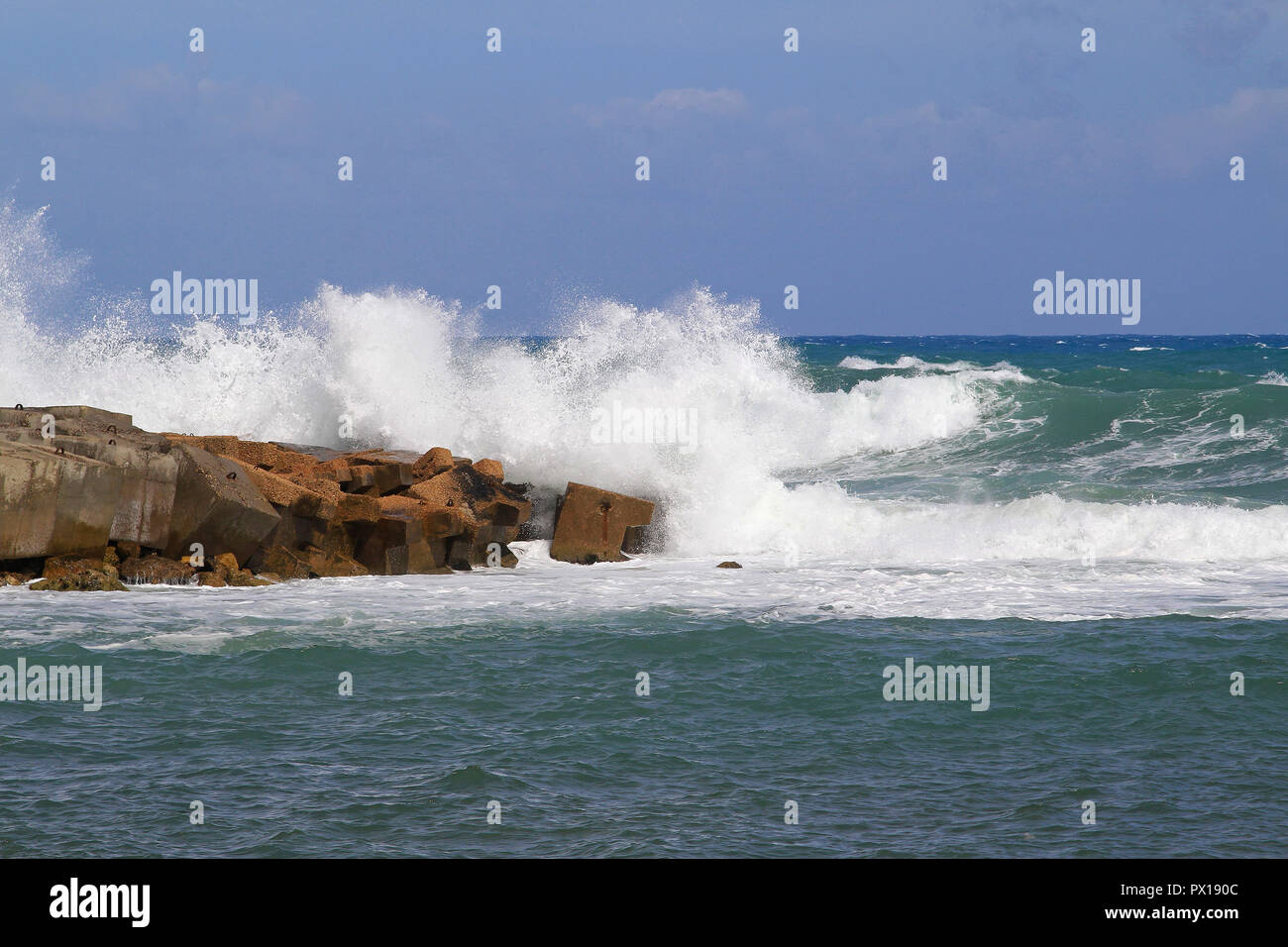 Water hitting the breakwall hi-res stock photography and images - Alamy