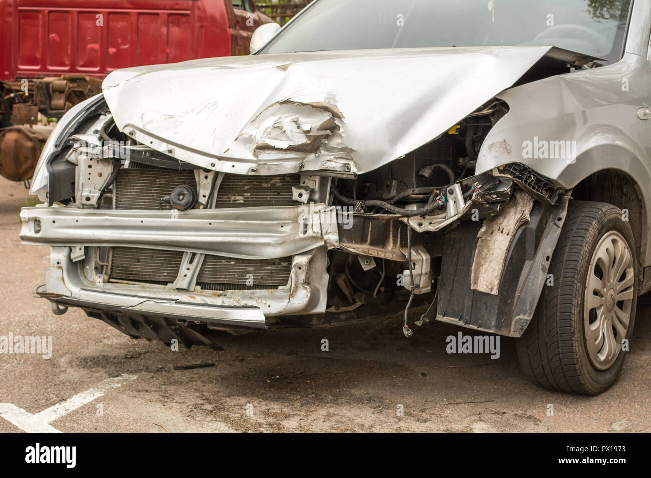 Broken car. White car after the crash. Rusty bumper Stock Photo - Alamy