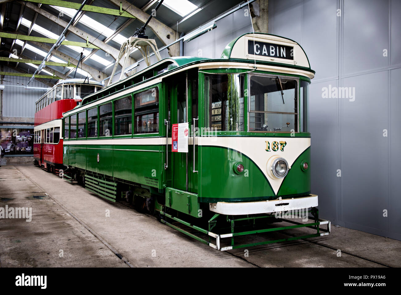 Beautifully restored and working trams in a garage at Crich Tramway ...