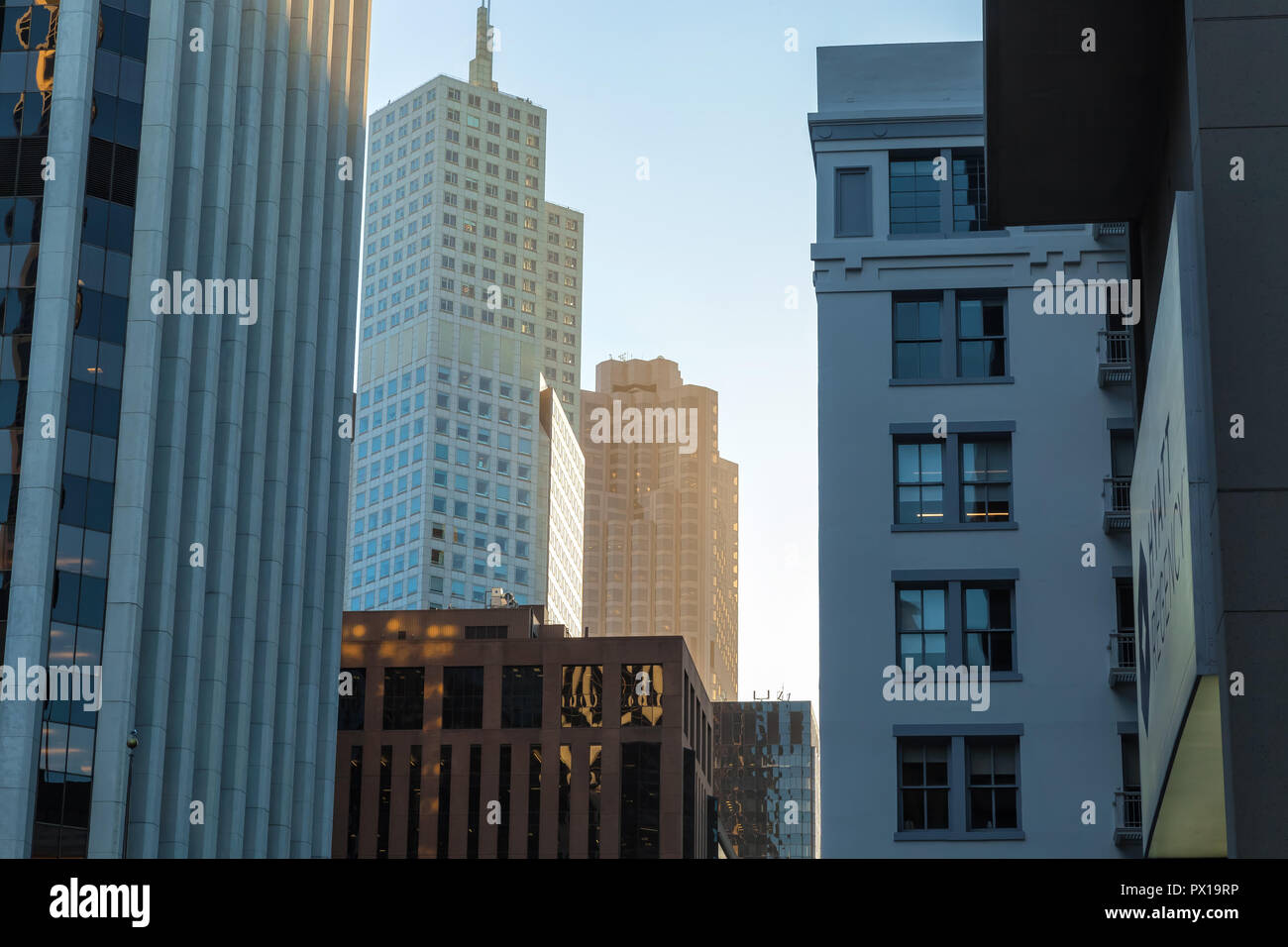Evening sunlight reflect on the high rises in downtown San Francisco ...