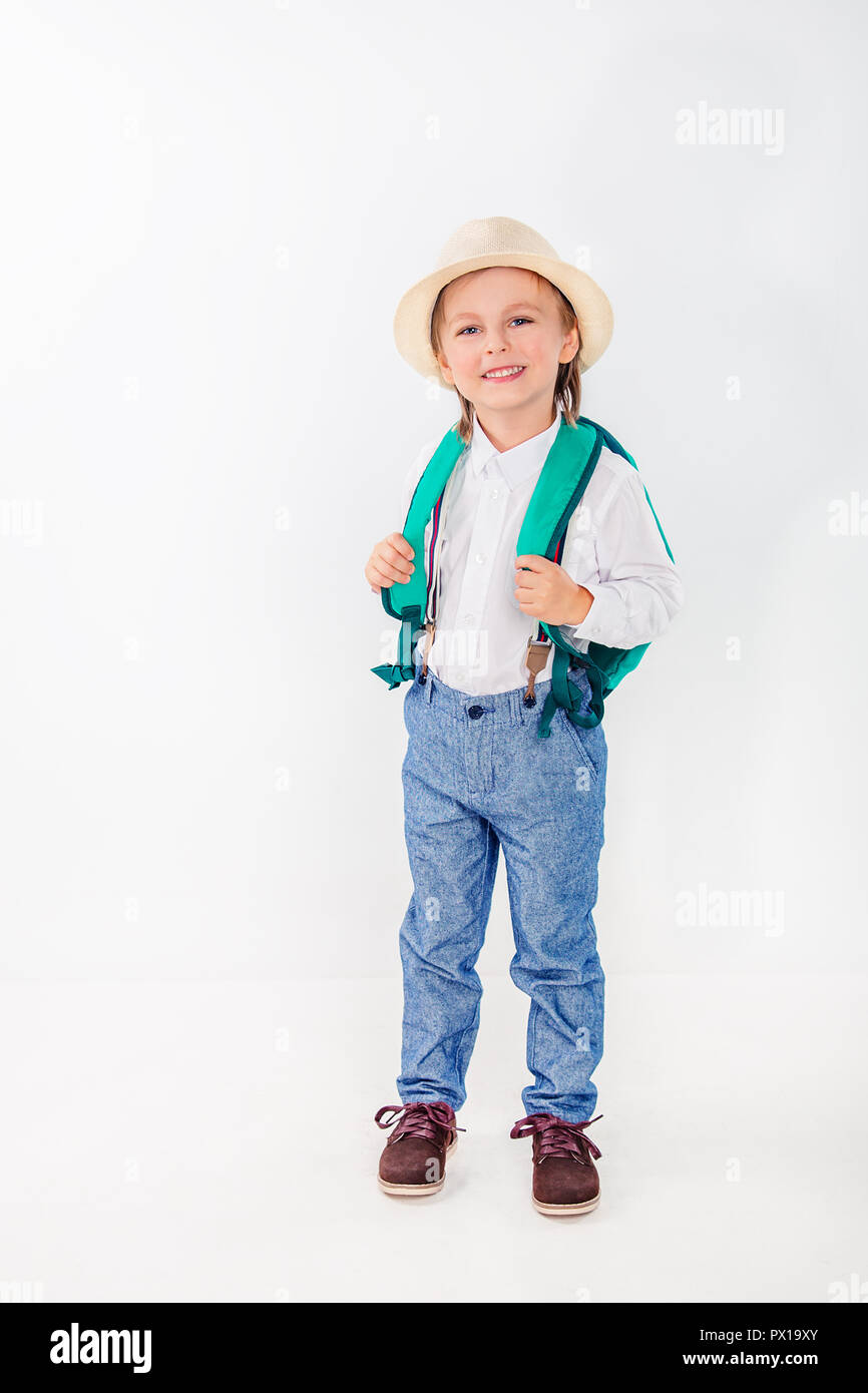 Little boy with a backpack on a white background. Stationery for school ...
