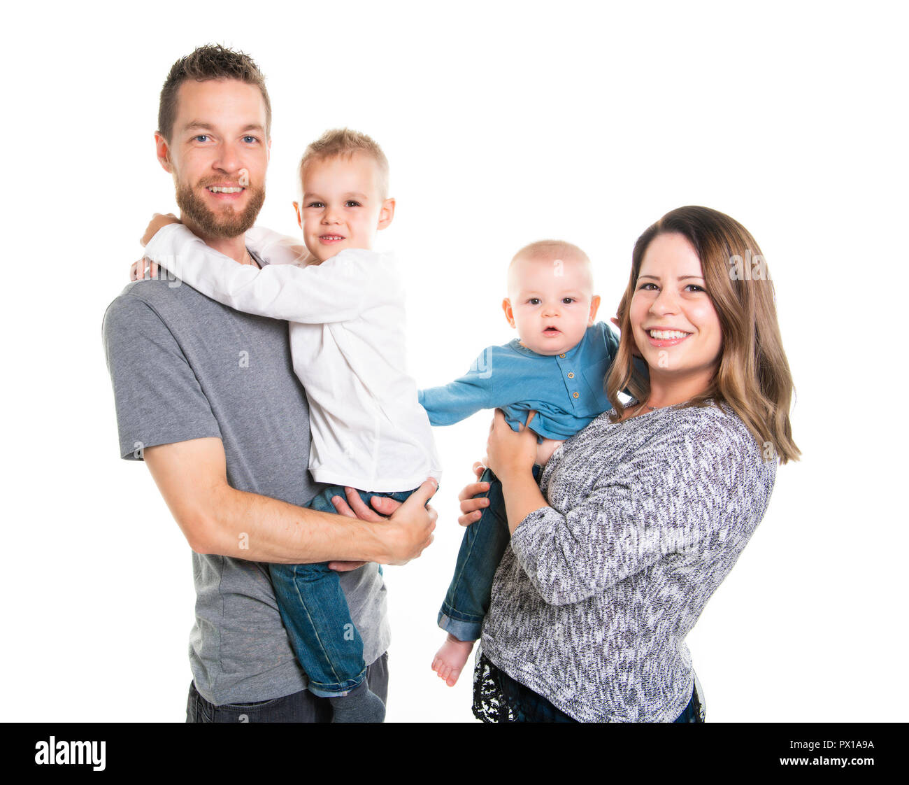 Family of four on studio white background Stock Photo - Alamy